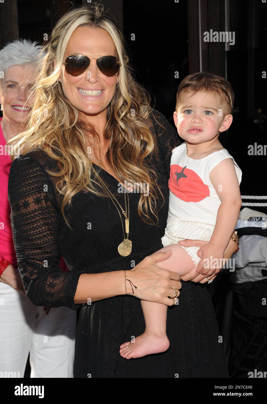 Actress Molly Sims and her son Brooks attend the 2013 Baby Buggy ...