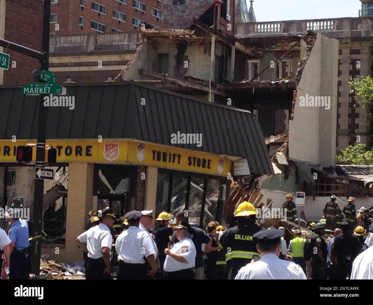 Emergency personnel respond to a building collapse in downtown ...