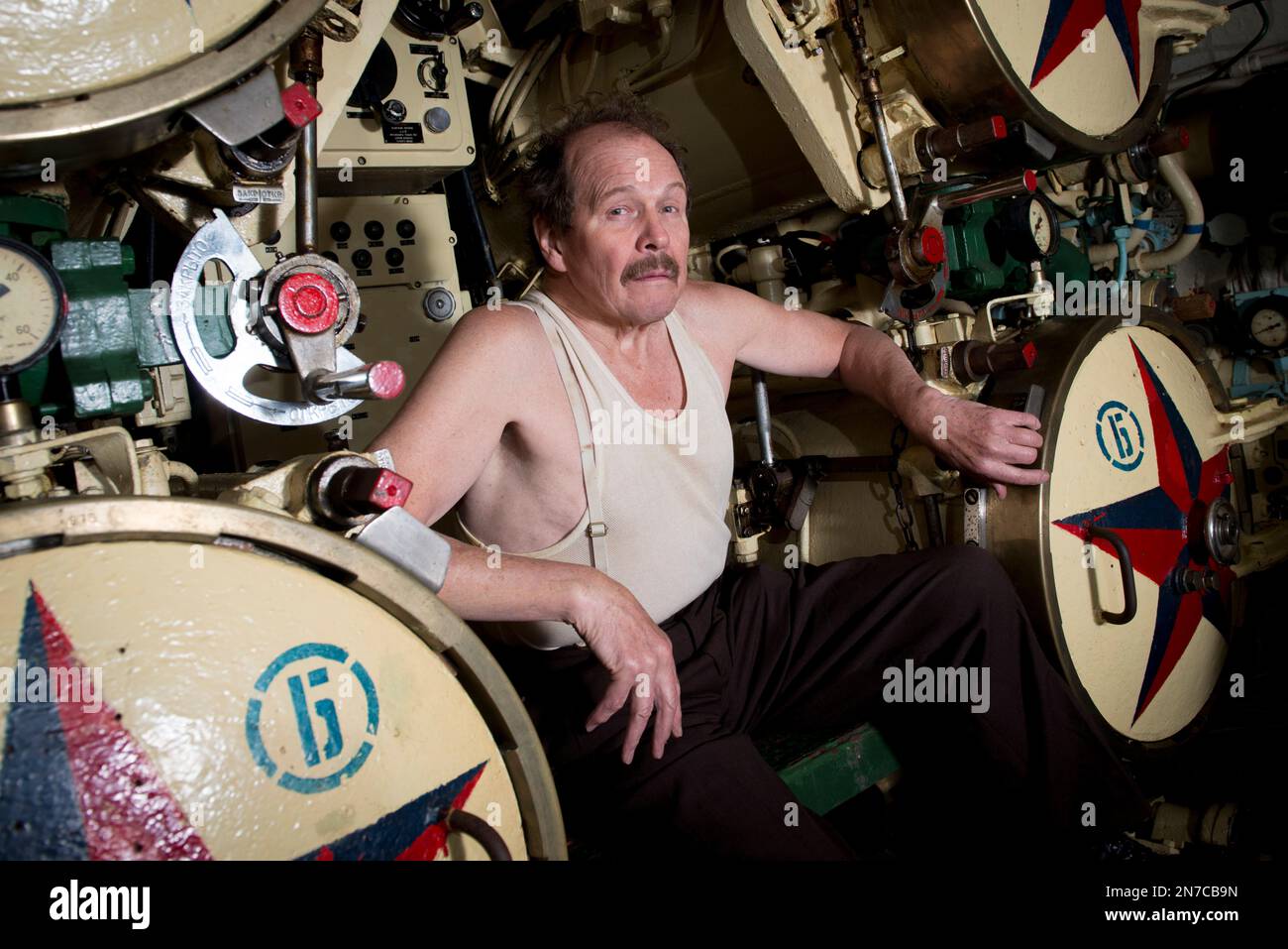 British actor, Stuart McGugan poses for photographs, during the filming ...