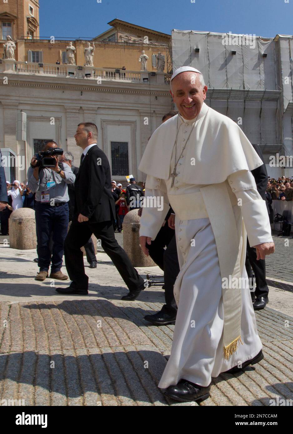 Pope Francis arrives in St. Peter's Square at the Vatican, for his ...