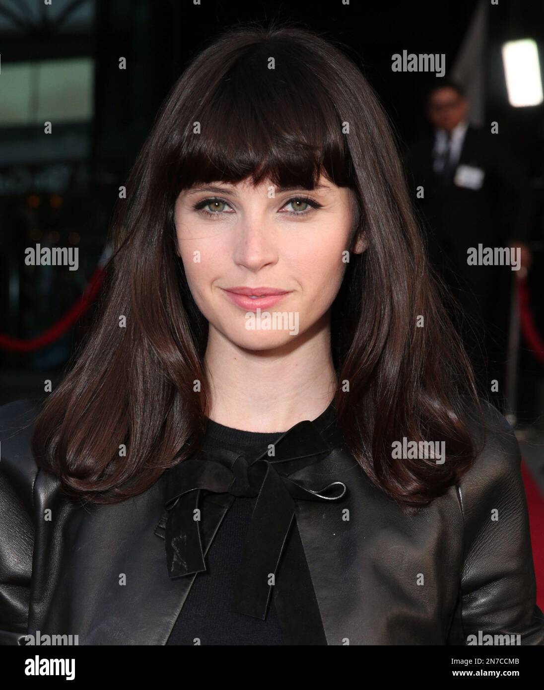 Felicity Jones arrives at the LA premiere of "The Bling Ring" at the ...