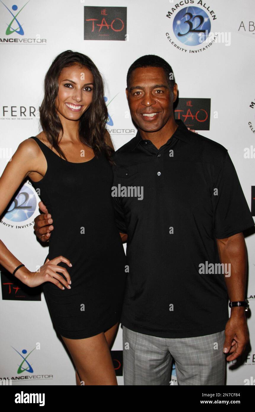 Model Jordyn Barnewall and Marcus Allen pose at Marcus Allen Foundation ...