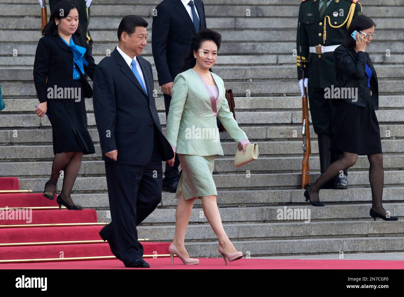 Chinese first lady Peng Liyuan, right, and Chinese President Xi Jinping ...