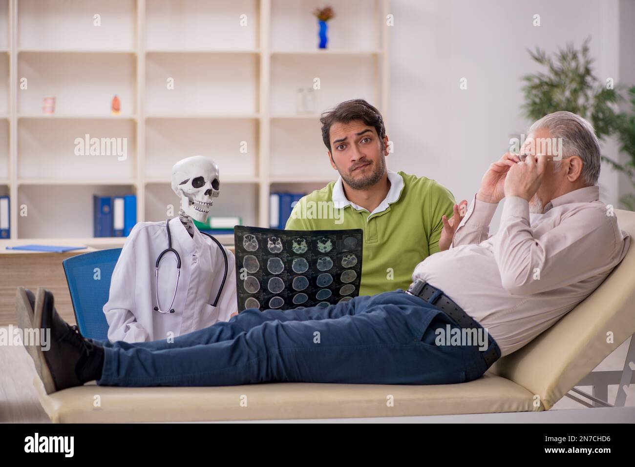 Old male patient visiting dead doctor radiologist Stock Photo - Alamy