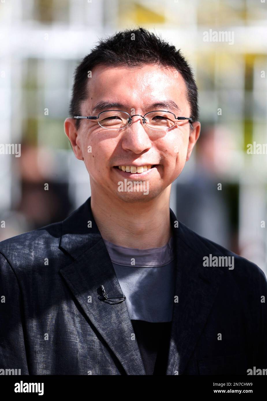 Japanese architect Sou Fujimoto, 41, poses for photographers inside the ...
