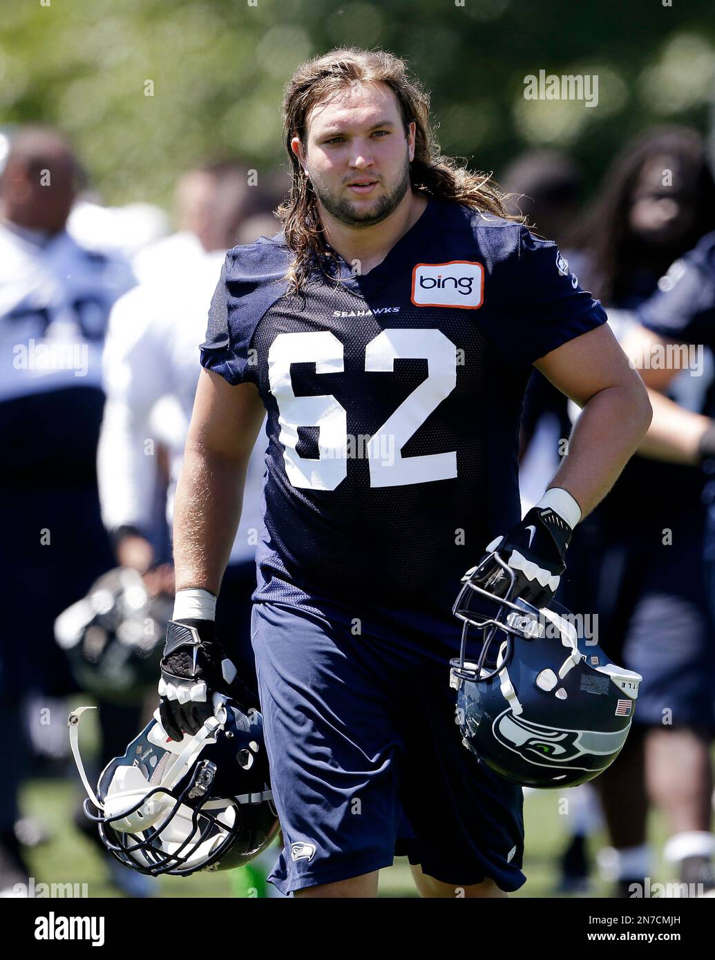 Seattle Seahawks' Ryan Seymour heads off the field Monday, June 3, 2013 ...