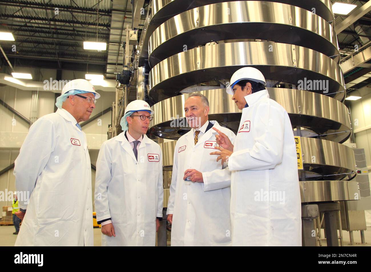 IMAGE DISTRIBUTED FOR MULLER QUAKER DAIRY - From left, Theo Muller, owner Theo Muller Group ...