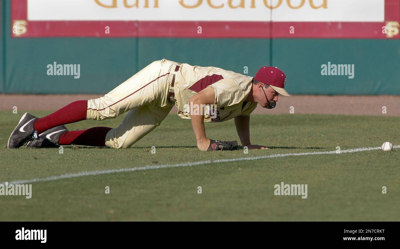 Florida State right fielder Josh Delph (2) eyes a ball hit by Troy's ...