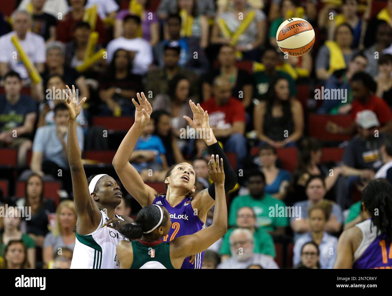 Seattle Storm's Nakia Sanford, left, and Noelle Quinn and Phoenix ...