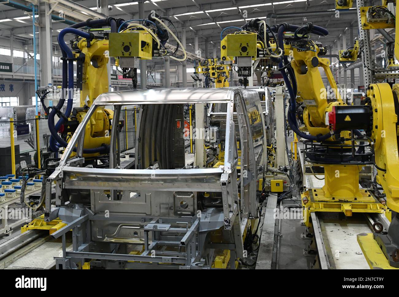 ZOUPING, CHINA - FEBRUARY 9, 2023 - A robot rivets an all-aluminum ...