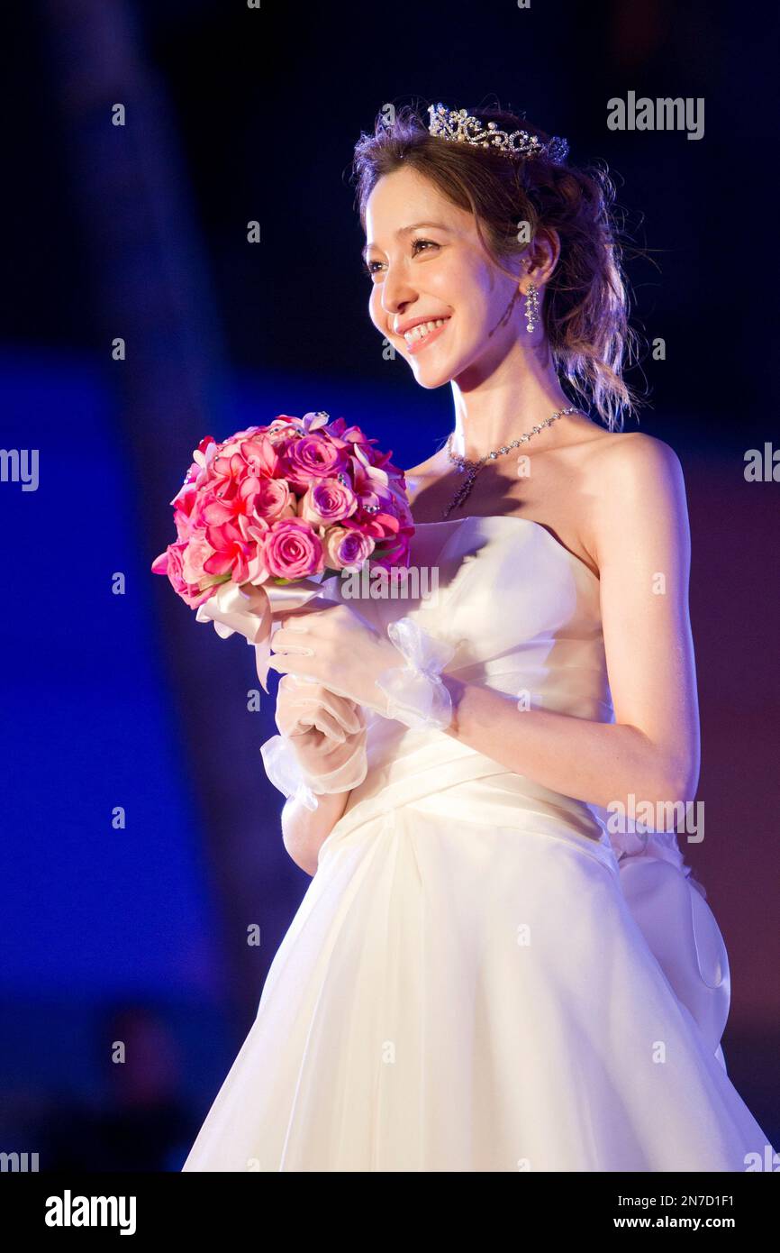 Lena Fujii walks on the runway at the Hawaii May! Collection fashion ...