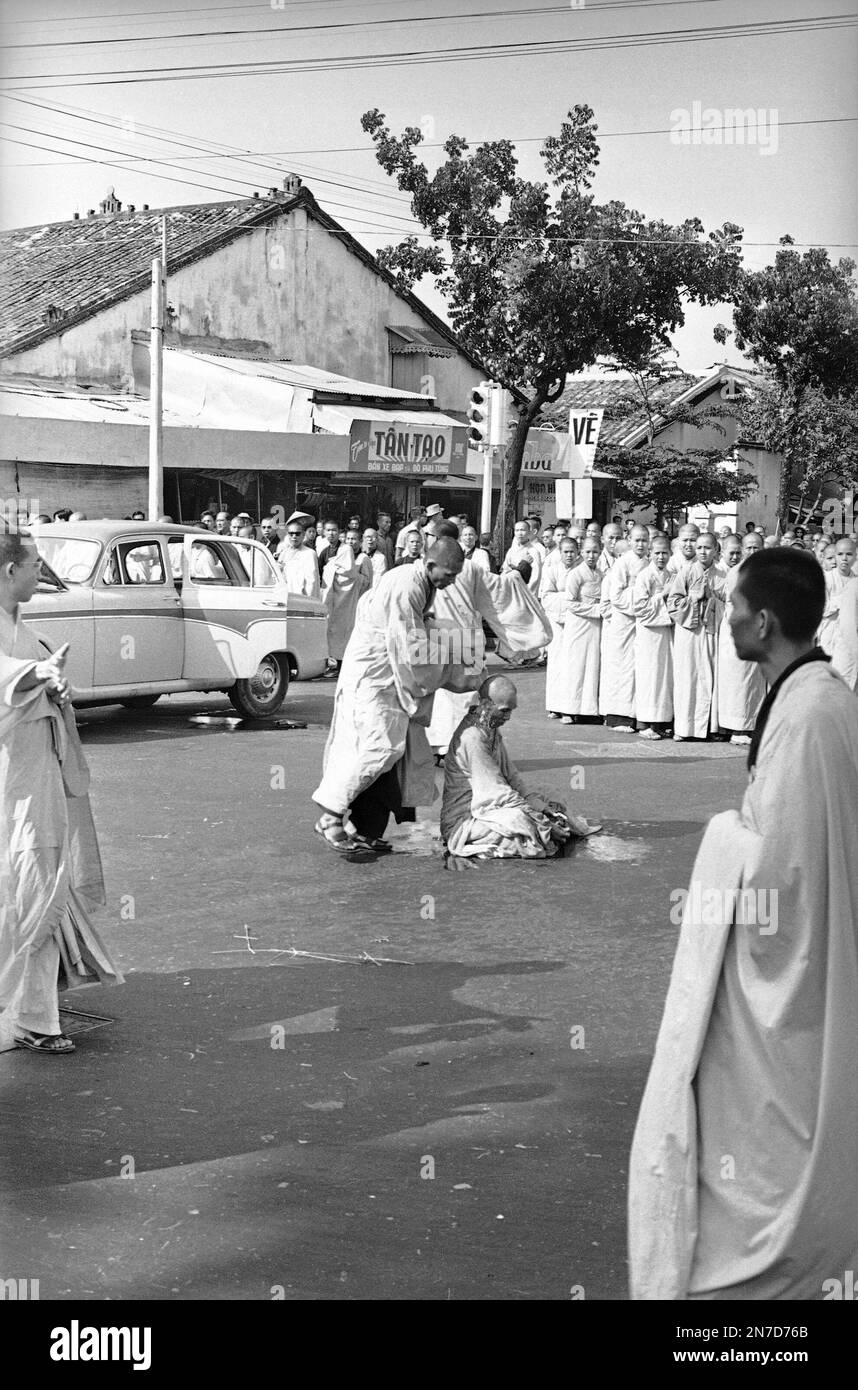 Buddhist monk Thich Quang Duc is doused with gasoline during a protest ...