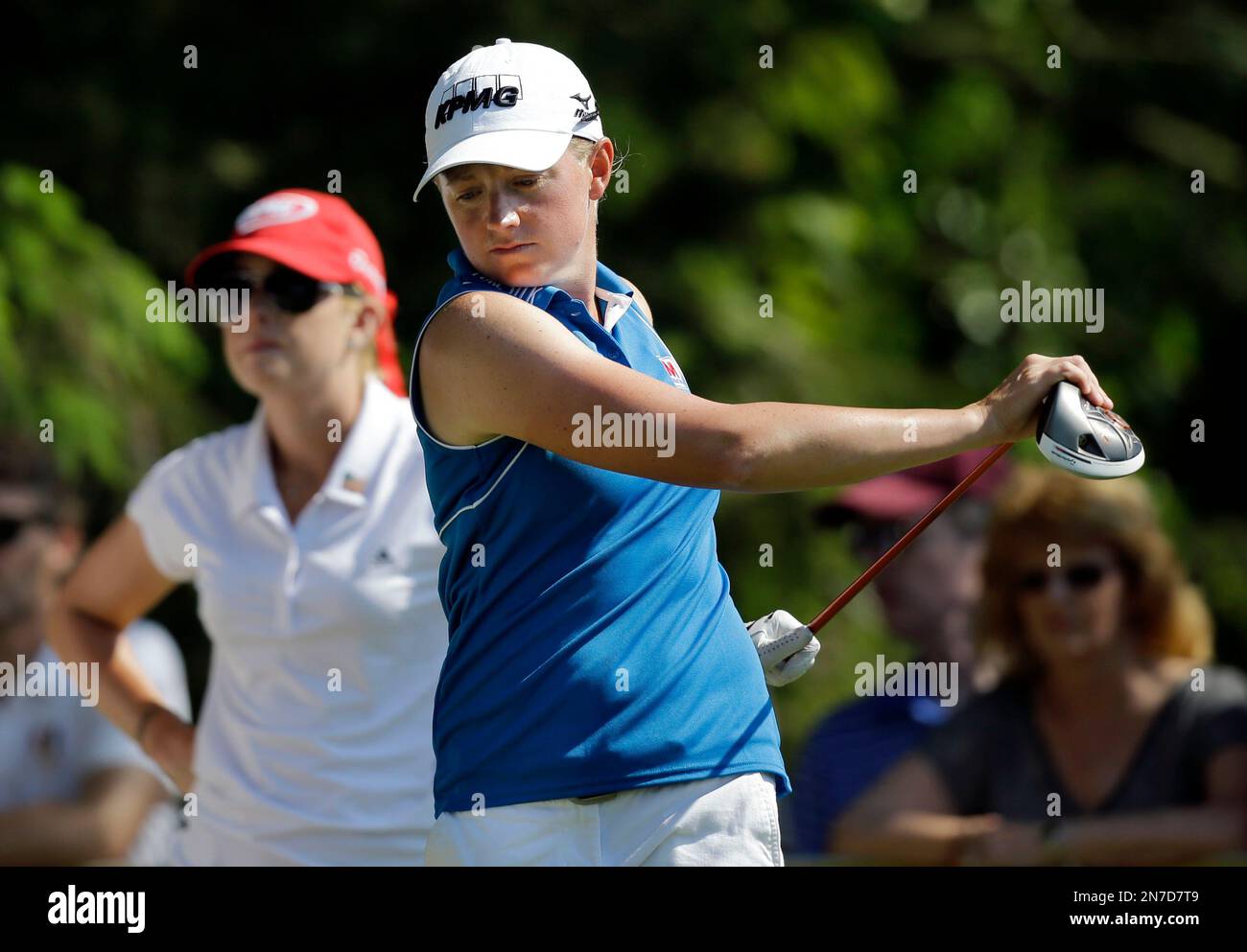 Defending champion Stacy Lewis stretches during the ShopRite LPGA ...