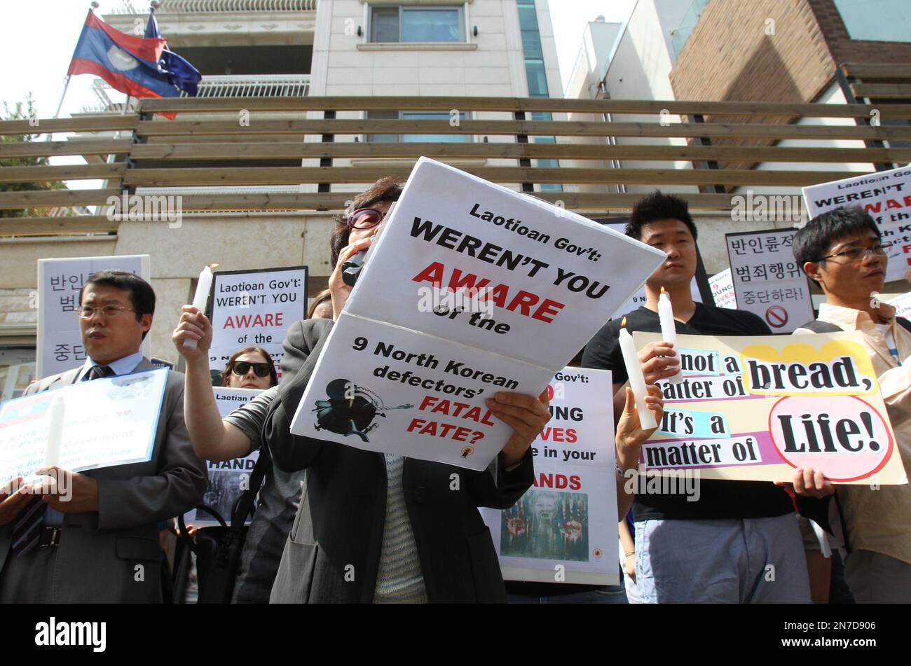 Human right activists stage a rally demanding the Laos government to ...