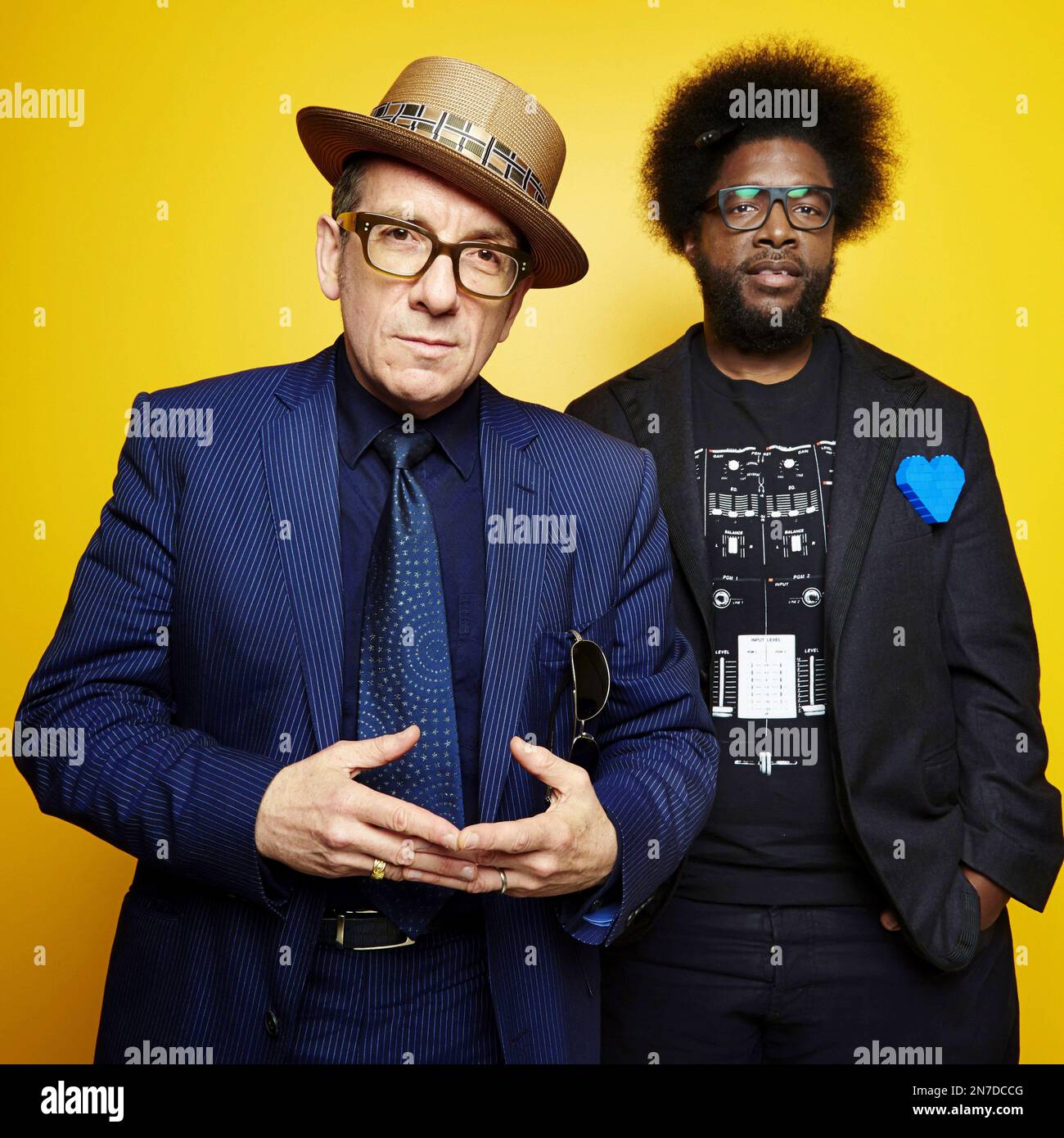 From left, English singer-songwriter Elvis Costello poses for a ...