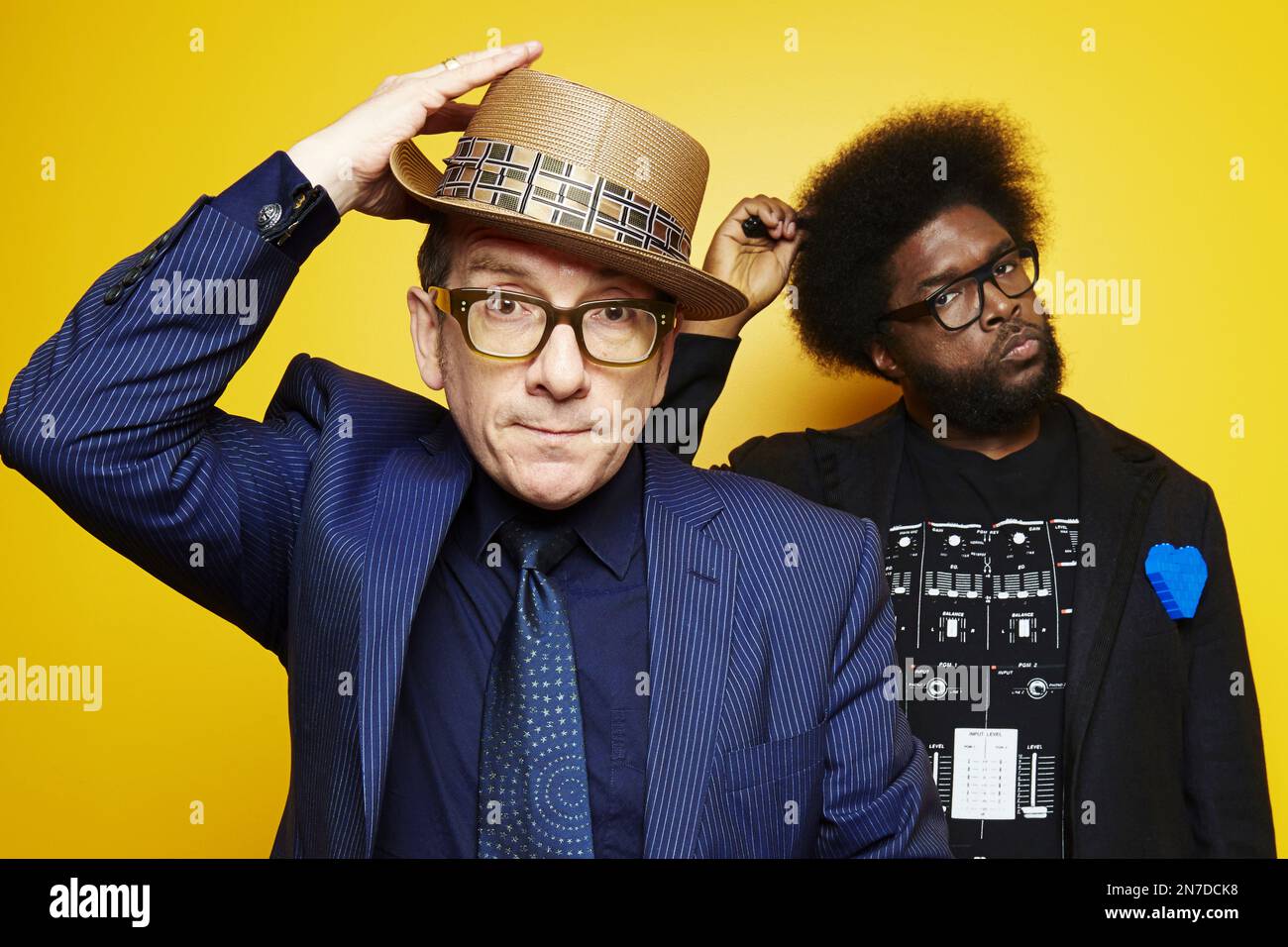 From left, English singer-songwriter Elvis Costello poses for a ...