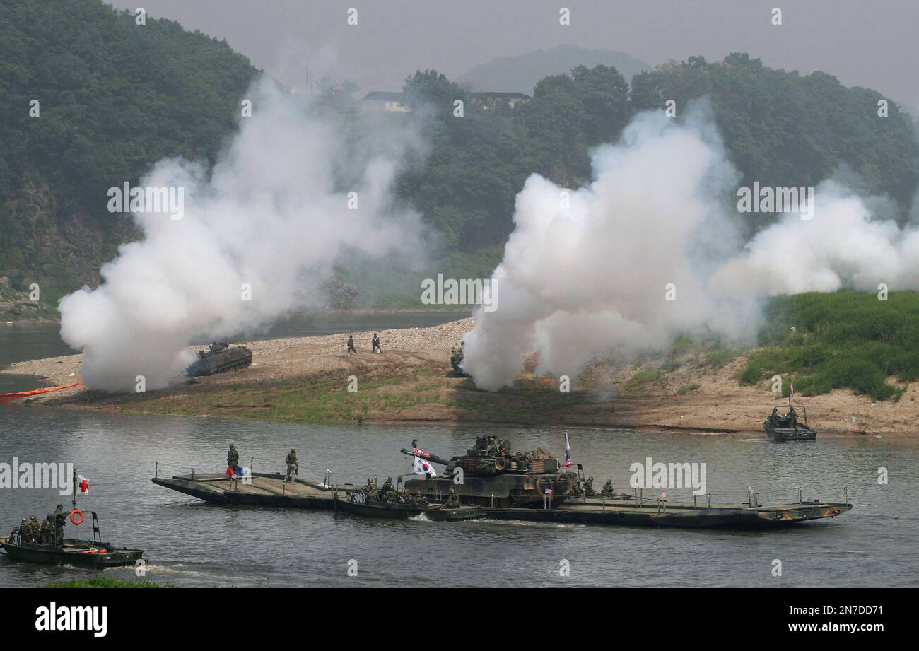 A U.S. Army M1A2 tank crosses Nam Han river on a South Korean military ...