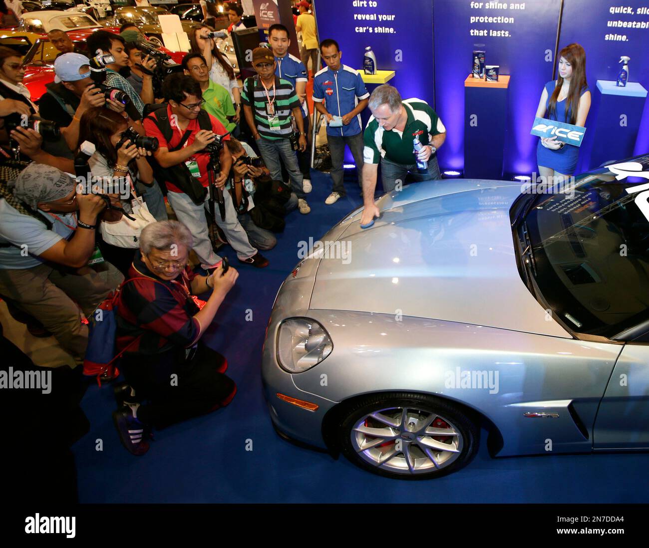 Dermot Maconaghie demonstrates his car care product on a Corvette Z06 ...
