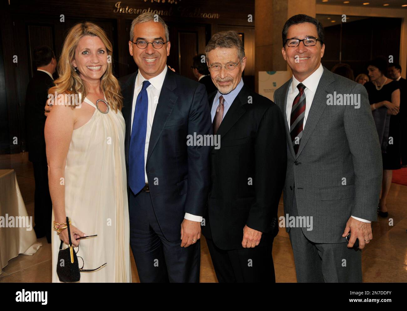 John Rogovin, second from left, and his wife Jaye, left pose with Barry ...