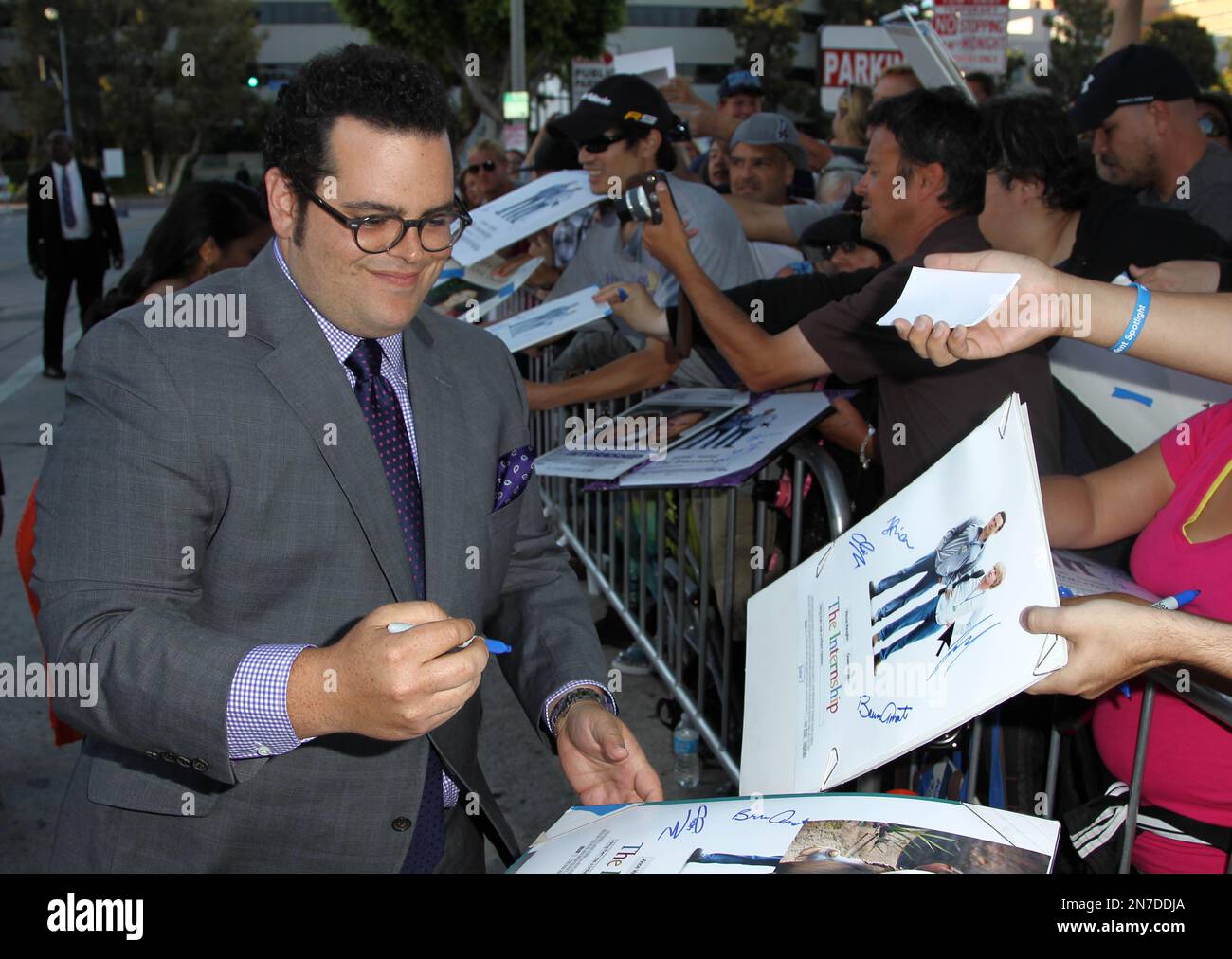 Josh Gad signs autographs at the world premiere of "The Internship" at ...