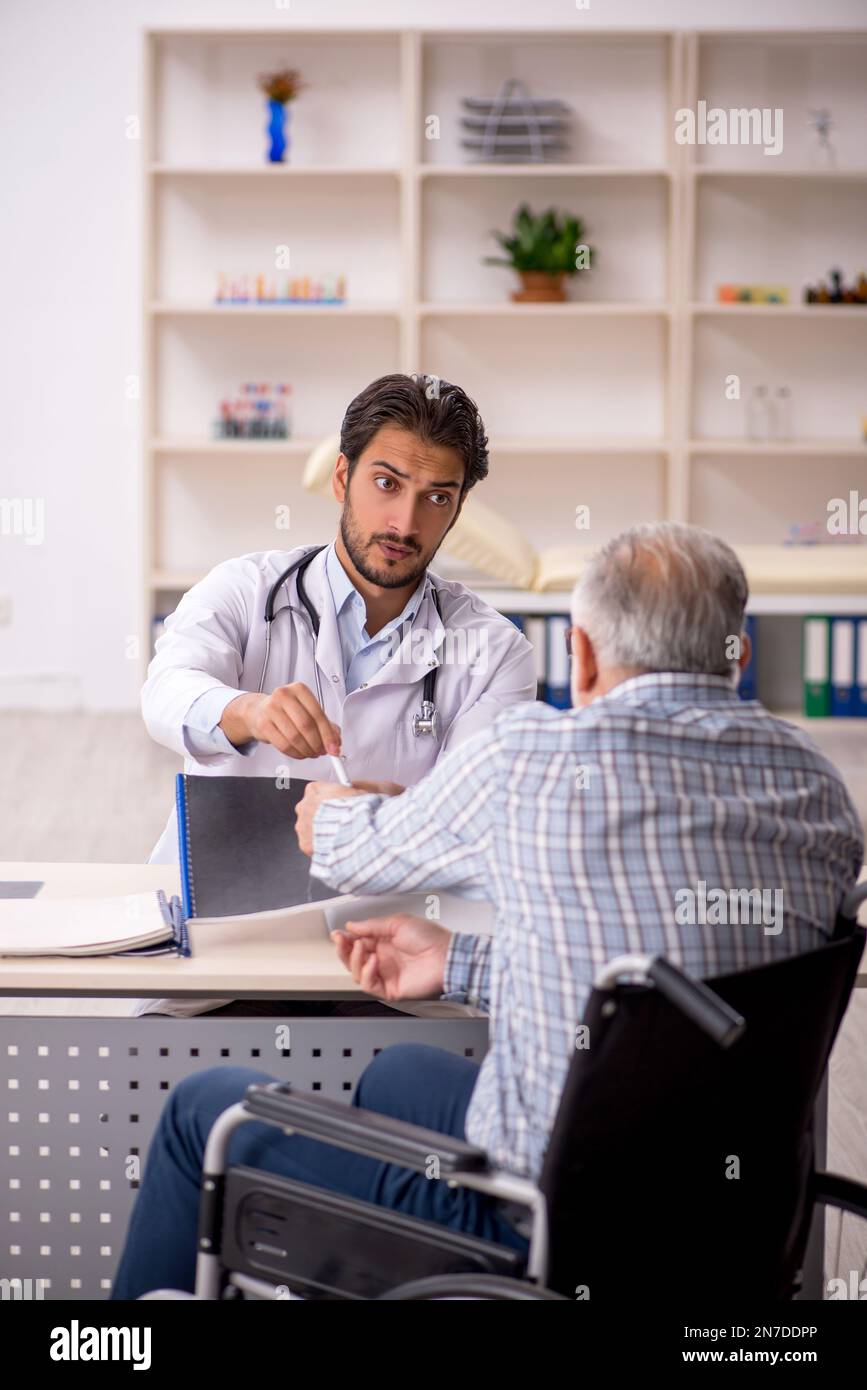 Old male patient signing hi-res stock photography and images - Alamy