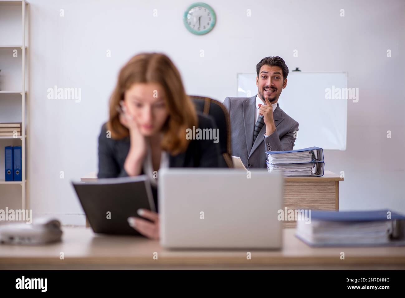 Supervisor reading sitting hi-res stock photography and images - Alamy