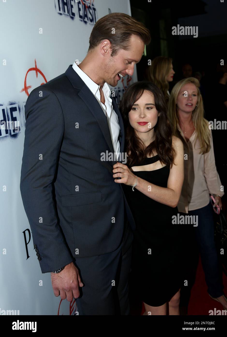 Alexander Skarsgard, left, and Ellen Page arrive at the LA premiere of ...