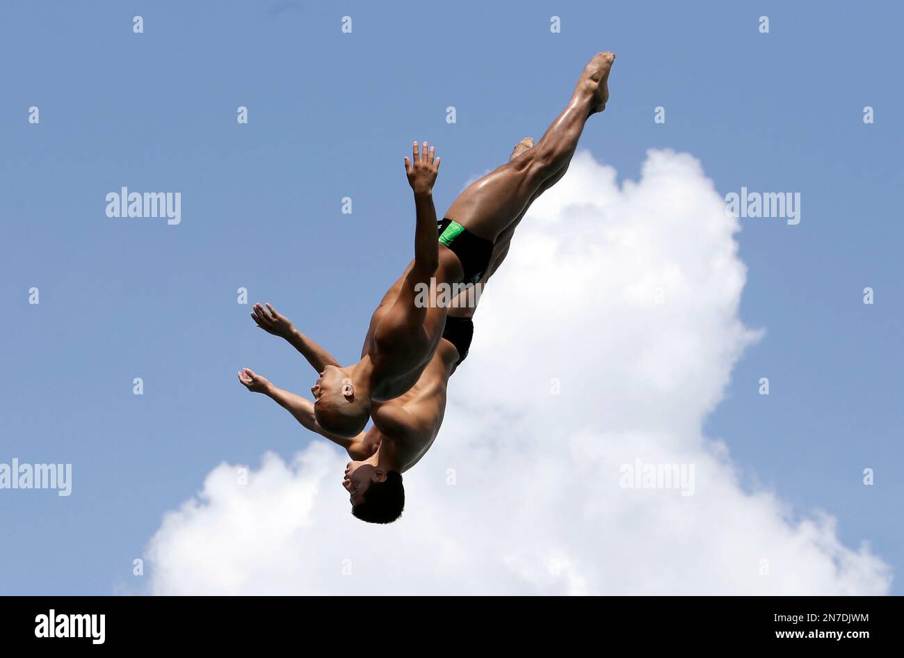 Phillippe Gagne, left, and Maxim Bouchard, right, of Canada compete in ...