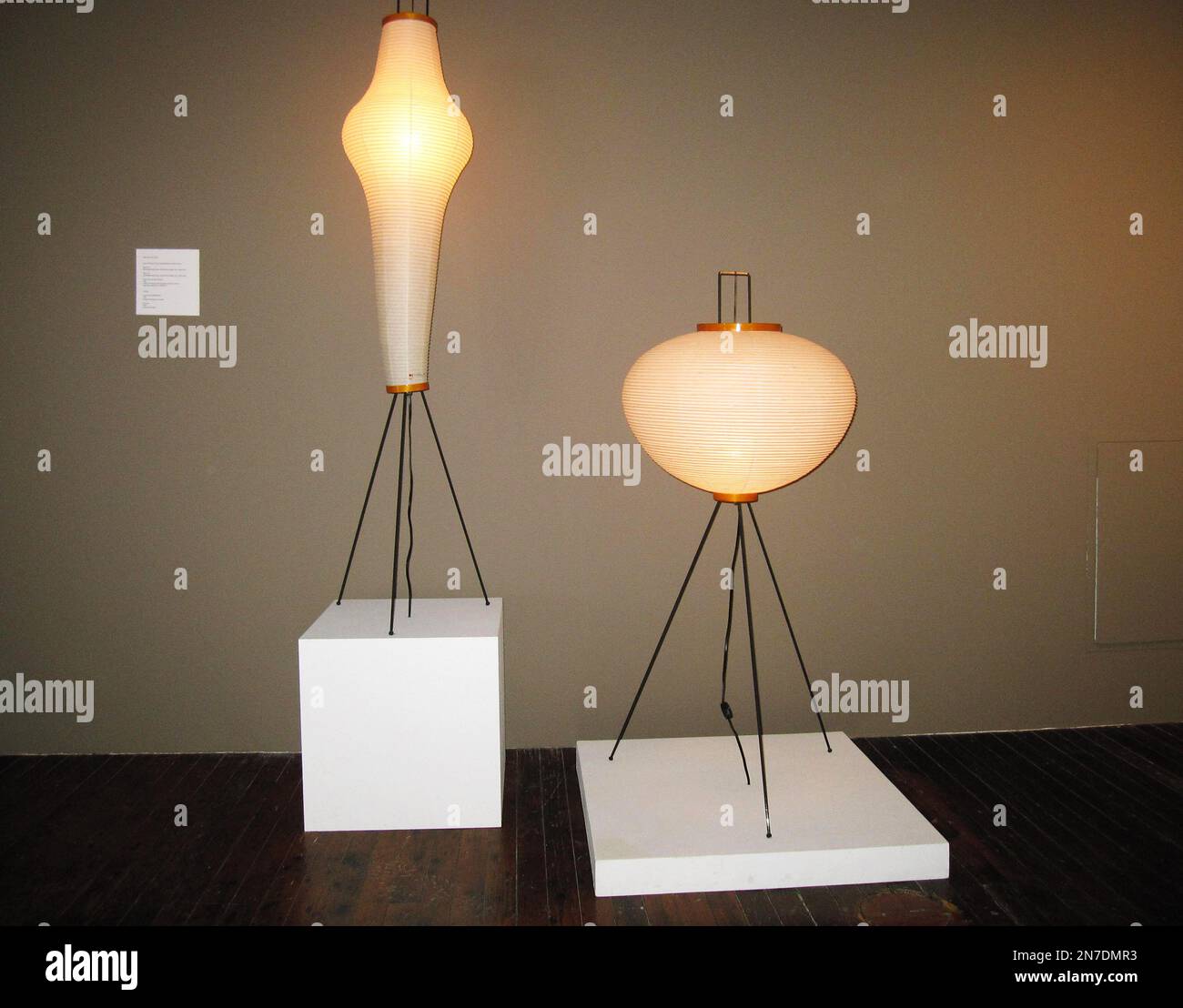 This April 20, 2013 photo shows two lighting sculptures on display at ...