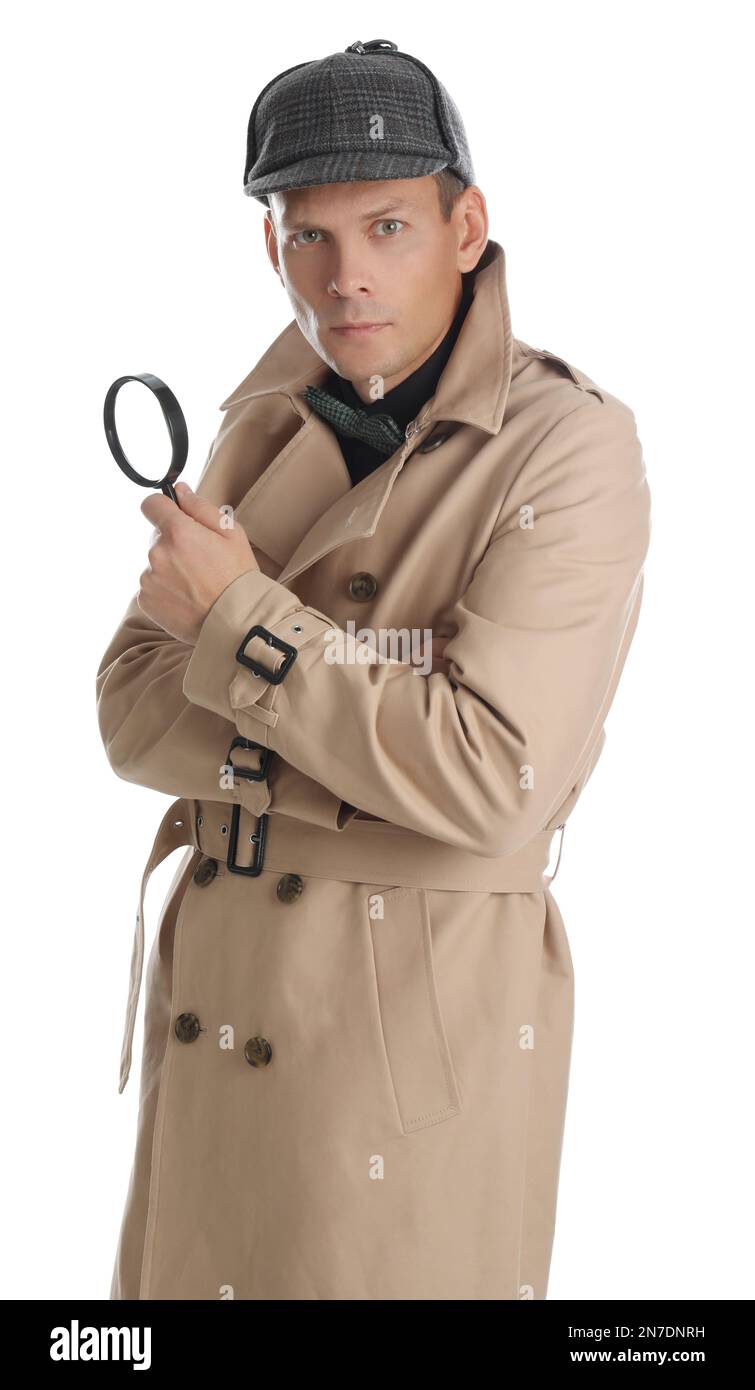 Male detective with magnifying glass on white background Stock Photo ...