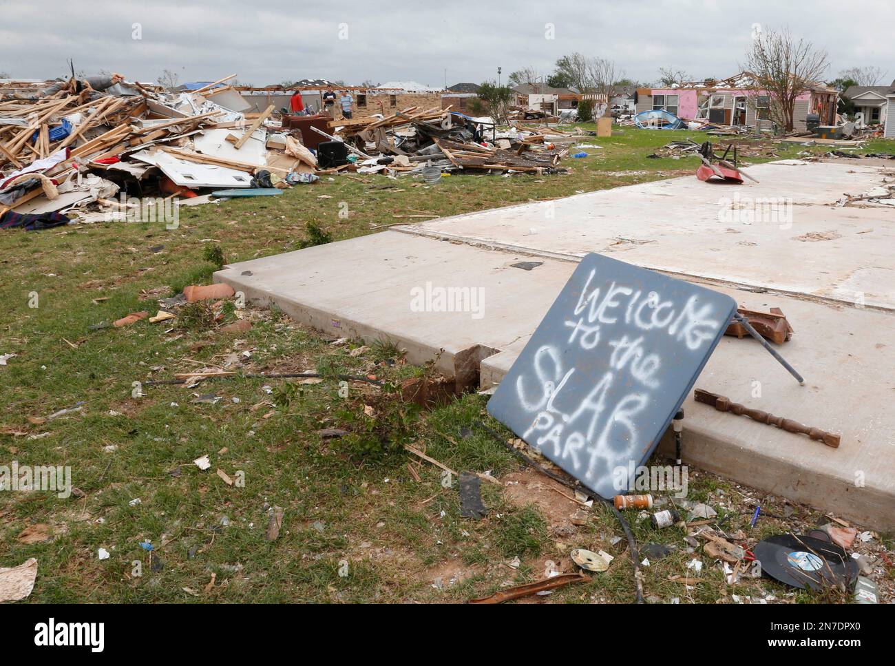 A sign reading "Welcome to the Slab Party" is posted on the slab of a ...