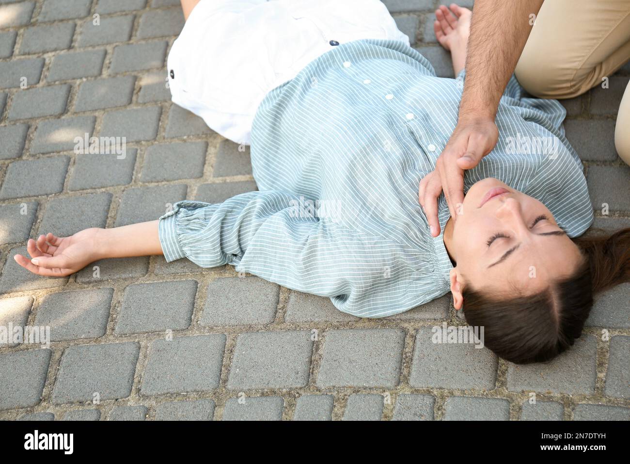 Checking pulse neck hi-res stock photography and images - Alamy