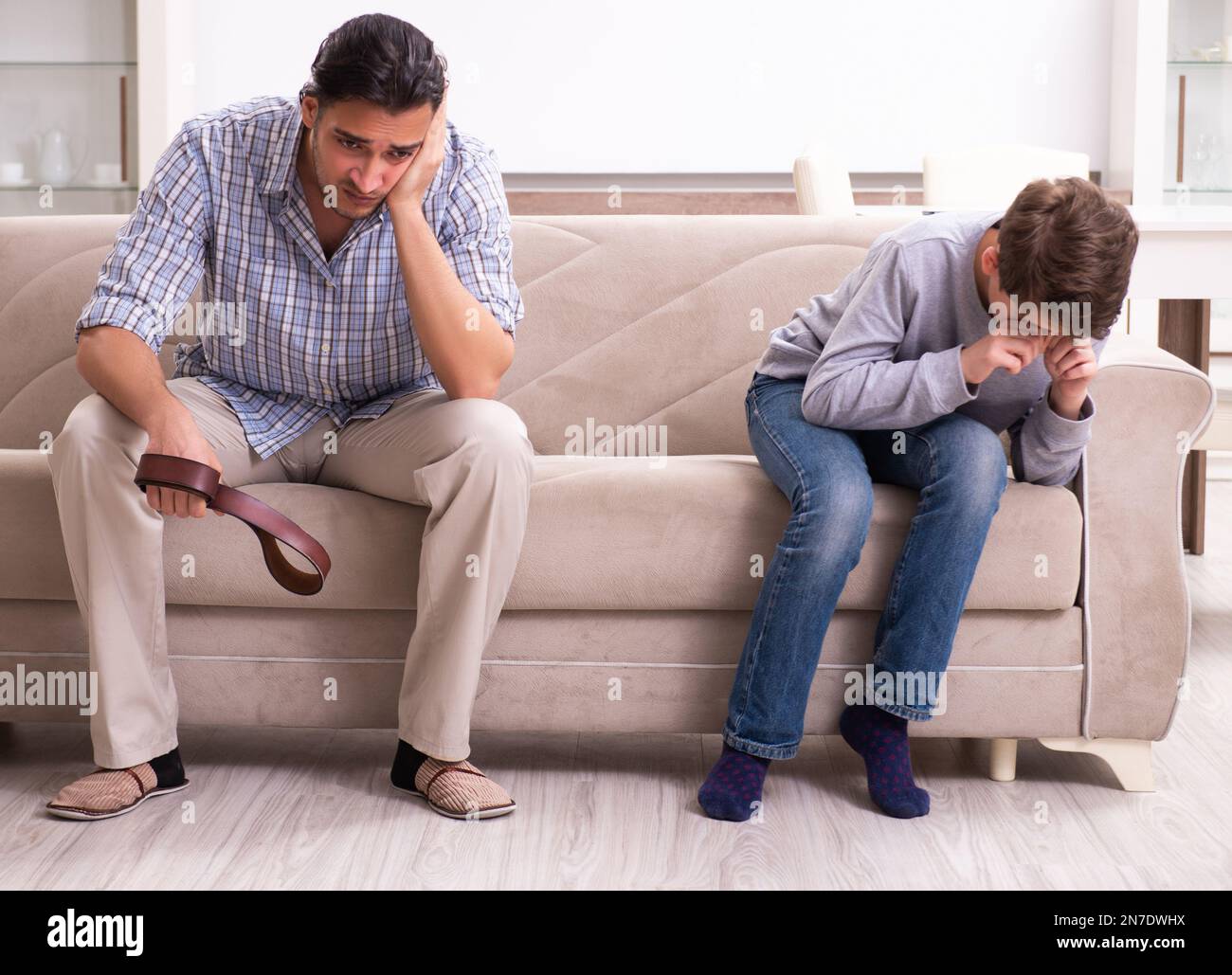 The father beating and punishing his sone Stock Photo - Alamy