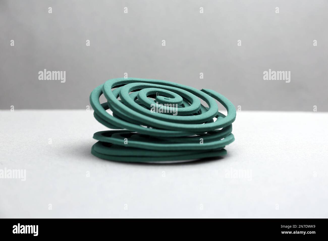 New insect repellent coils on grey background Stock Photo - Alamy