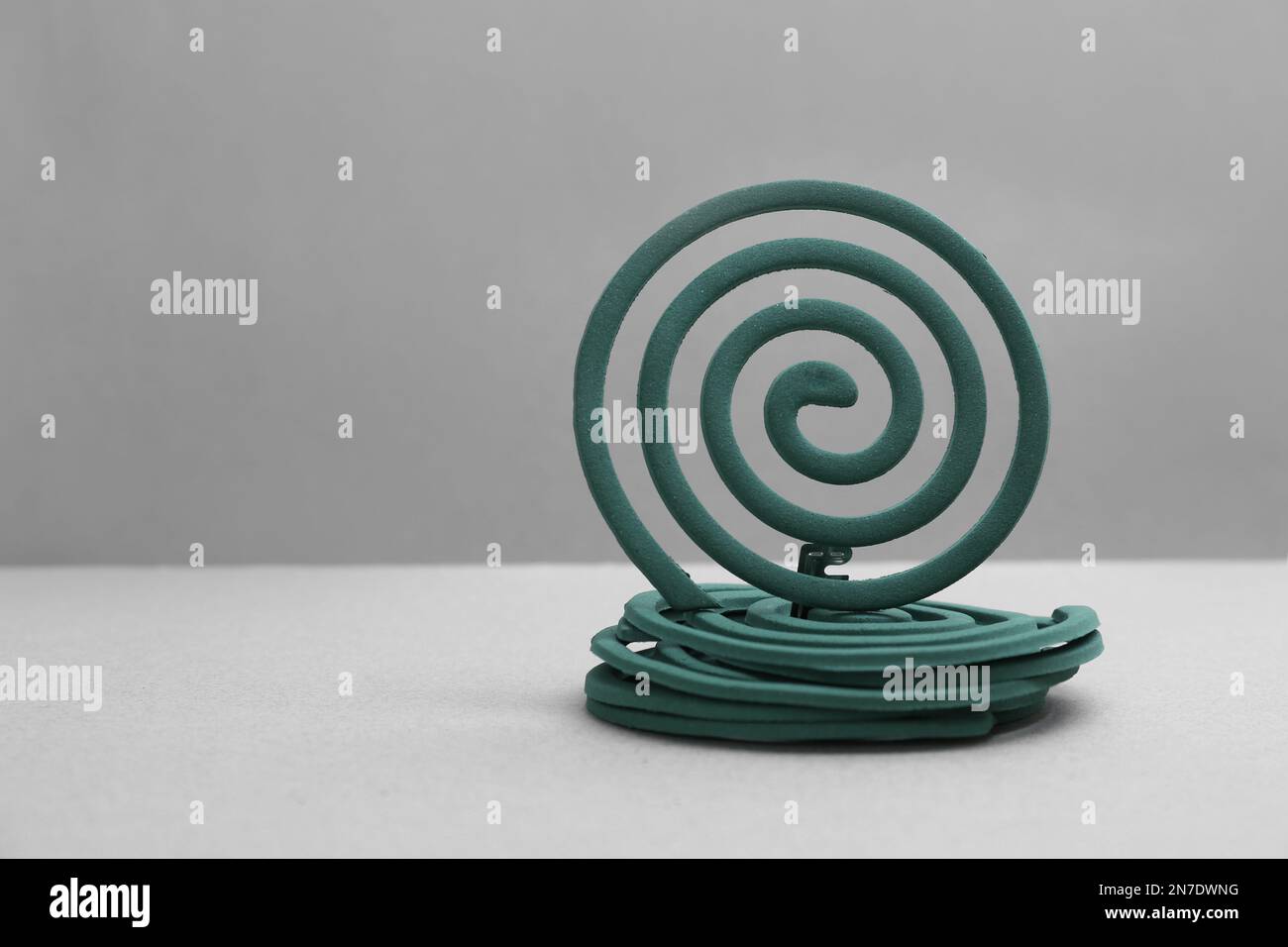 New insect repellent coils on grey background Space for text Stock ...