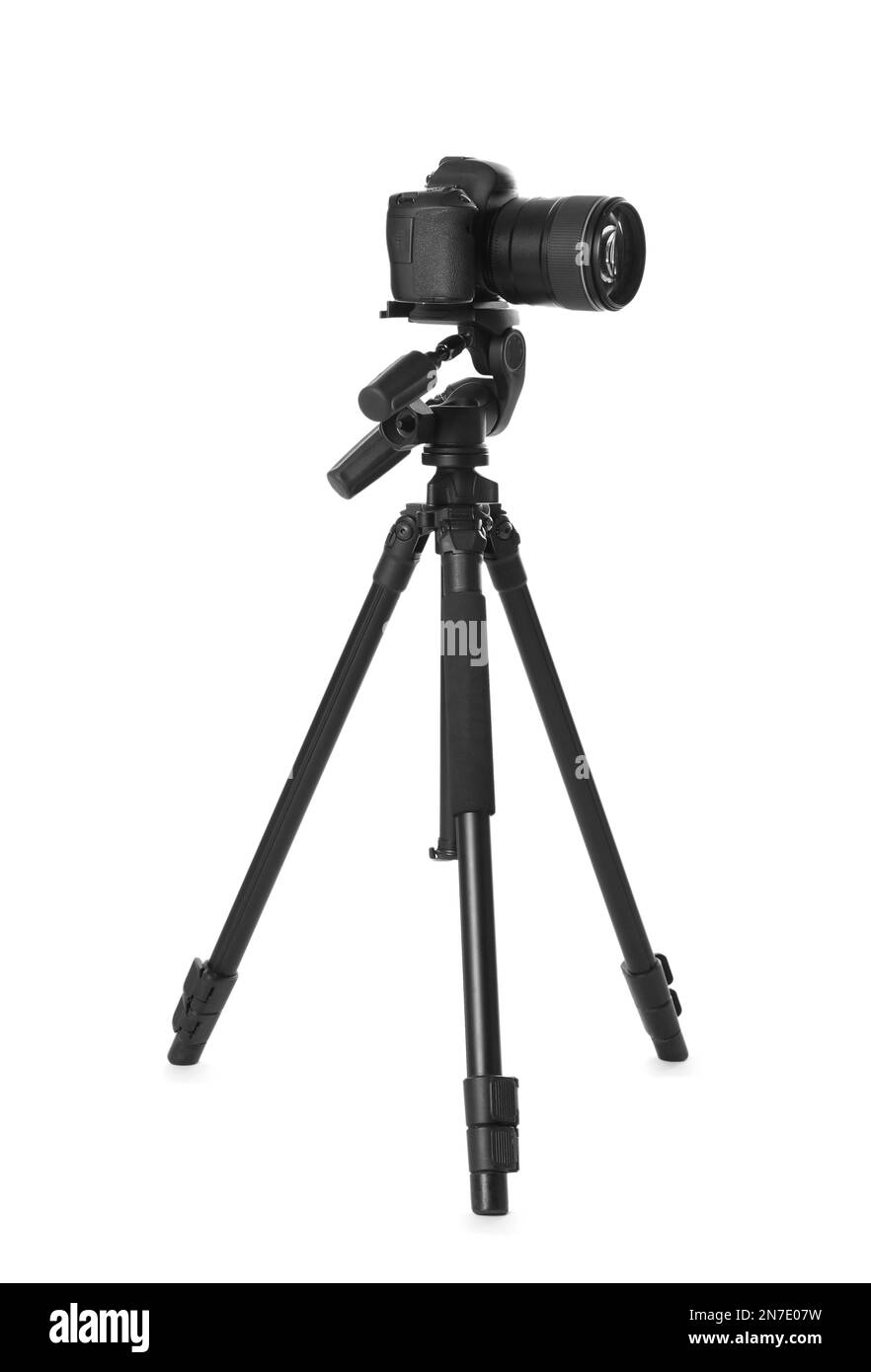 Modern tripod with camera isolated on white Stock Photo - Alamy