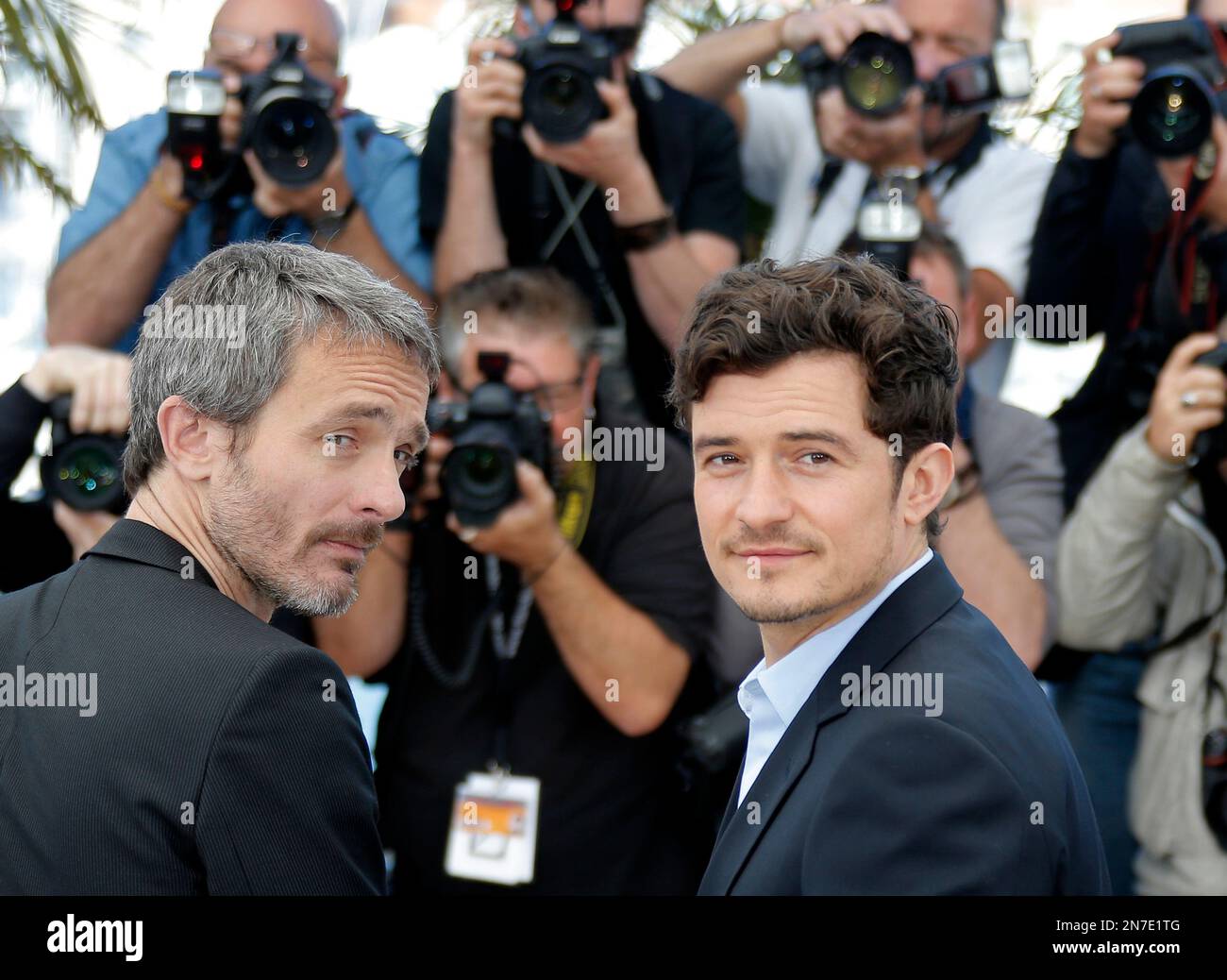 Director Jerome Salle, left, and actor Orlando Bloom pose for ...