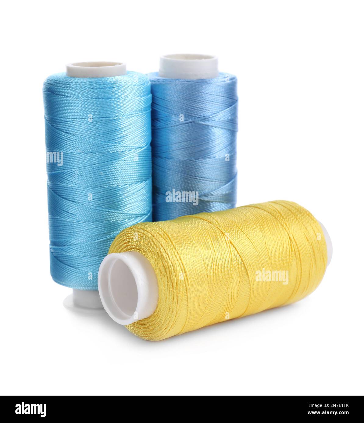 Set of colorful sewing threads on white background Stock Photo - Alamy