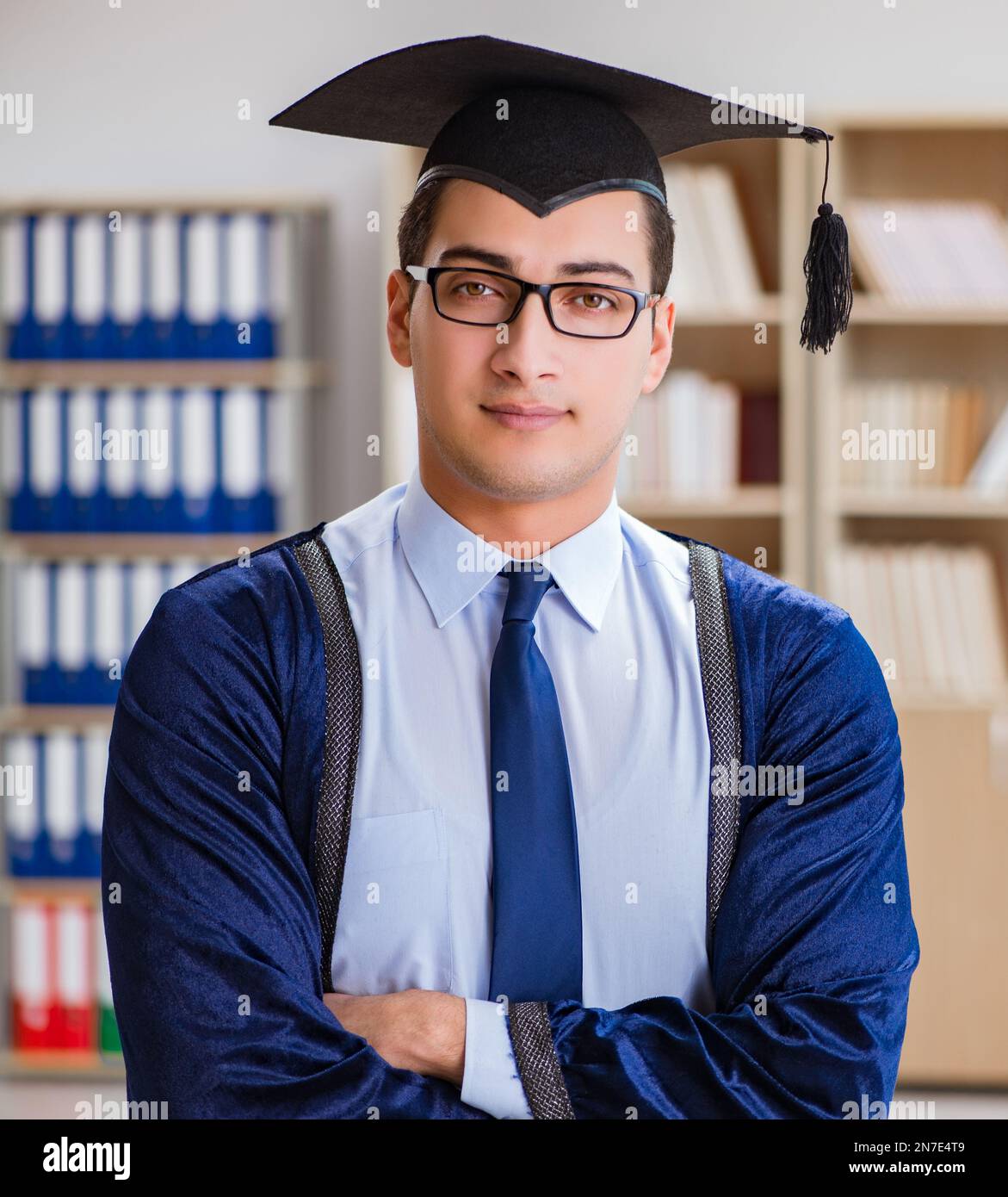 The young man graduating from university Stock Photo - Alamy