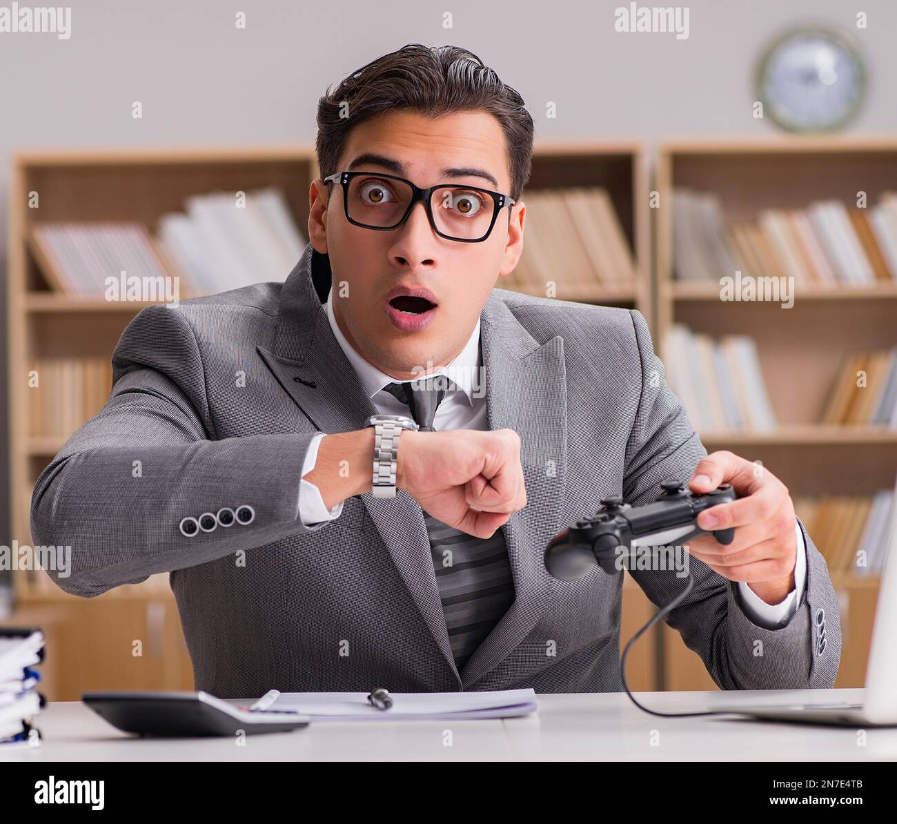 The businessman playing computer games at work office Stock Photo - Alamy