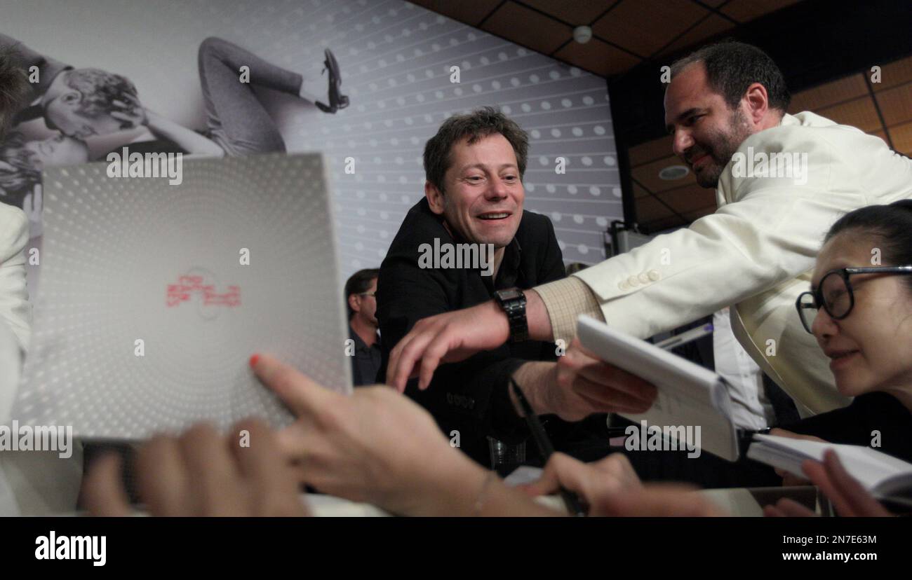 Actor Mathieu Amalric signs autographs during a press conference for ...