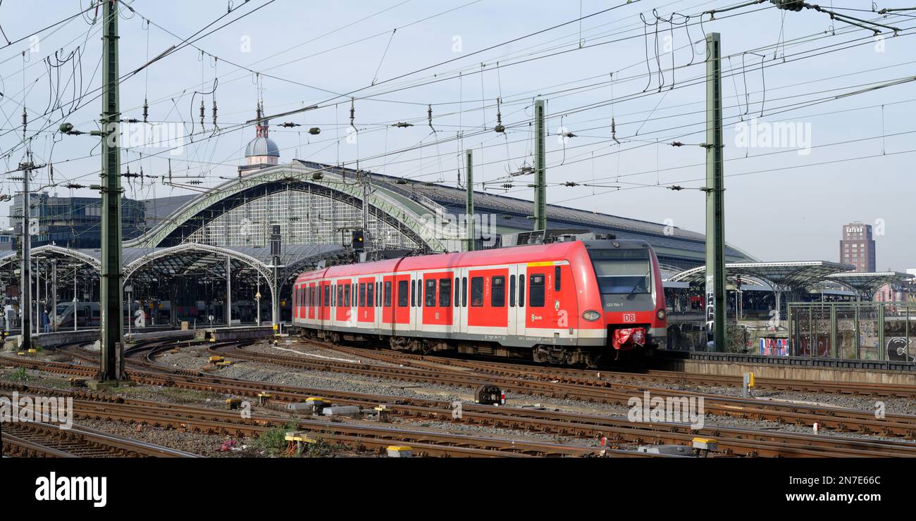 Cologne, Germany, February 09 2023 : a train leaving the historic ...