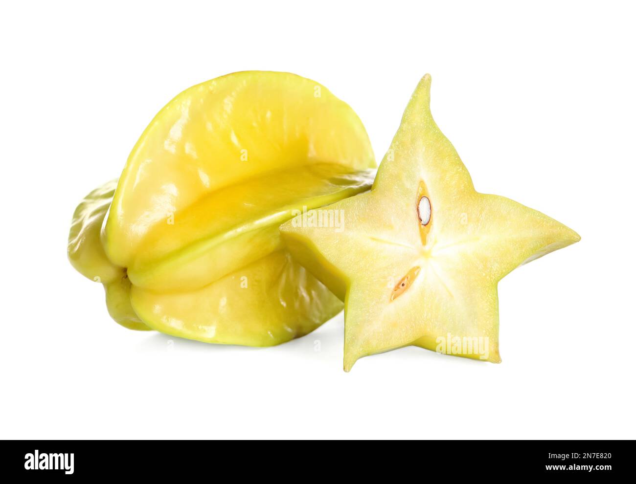 Cut and whole carambolas on white background Stock Photo - Alamy