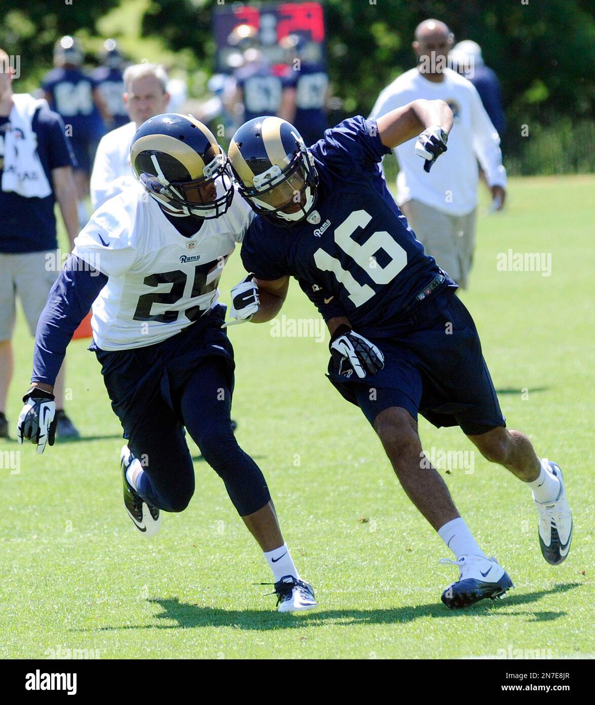 St Louis Ram's T.J. McDonald (25) runs a drill with Emory Blake (16 ...