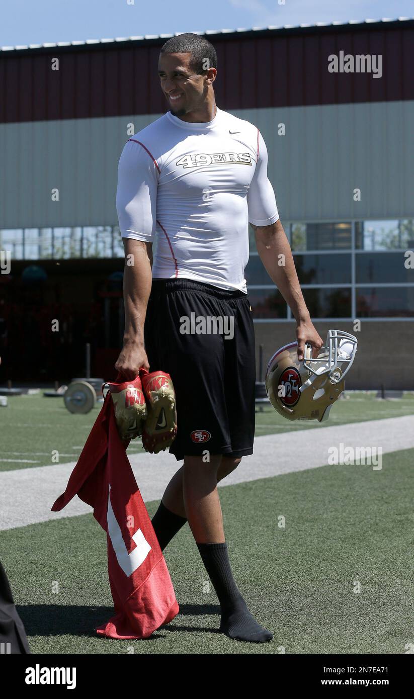 San Francisco 49ers quarterback Colin Kaepernick walks off the field ...