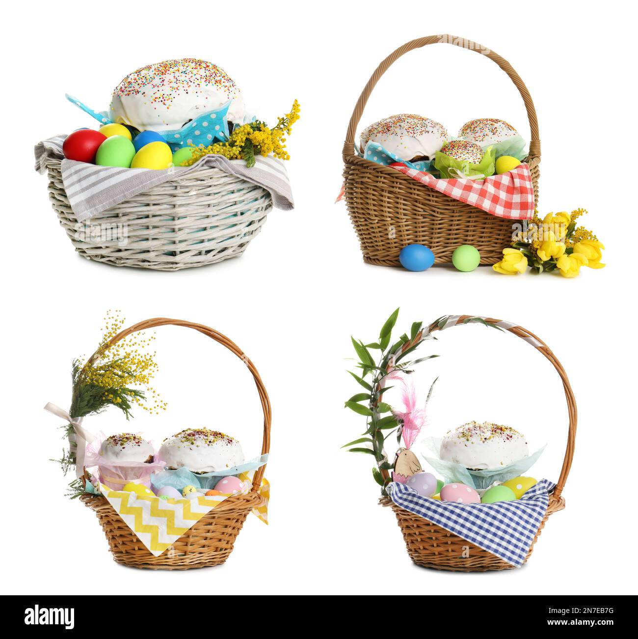 Set of wicker baskets with traditional Easter cakes and decor on white ...
