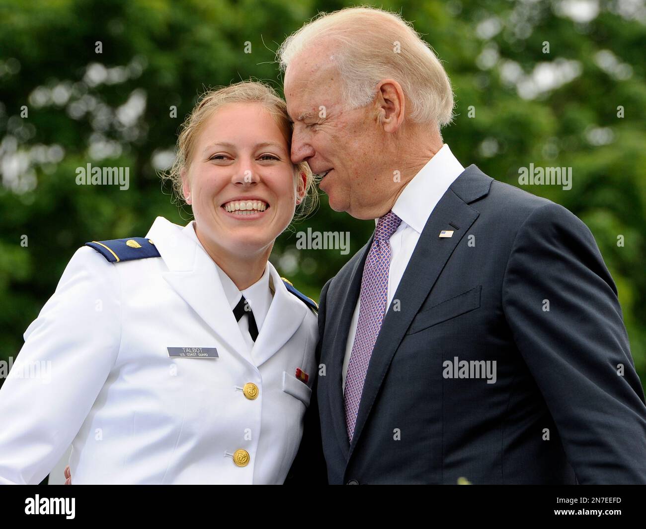 Newly commissioned officer Erin Talbot, left, poses for a photograph with Vice President Joe ...