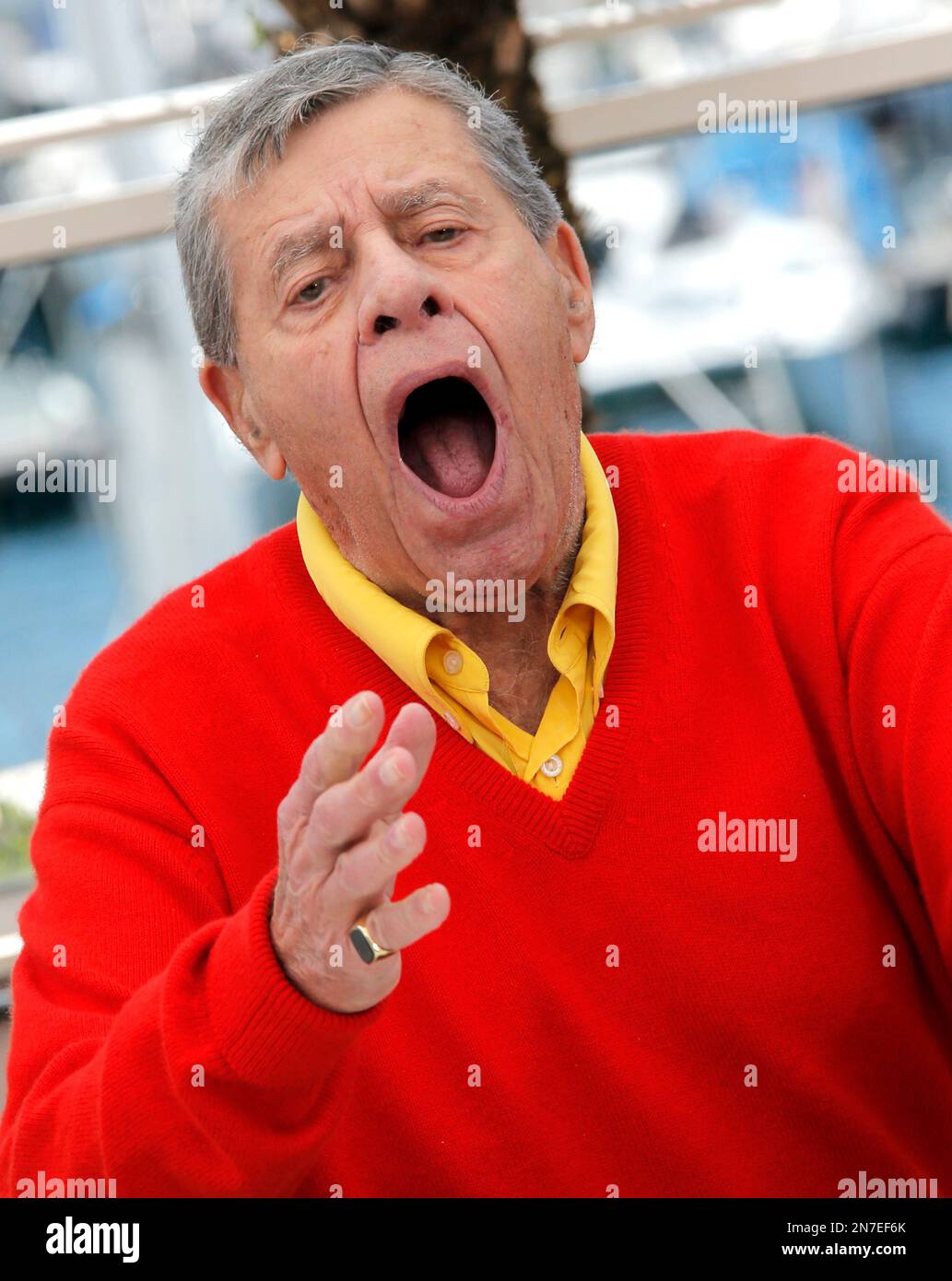 Comedian Jerry Lewis jokes with photographers during a photo call for ...