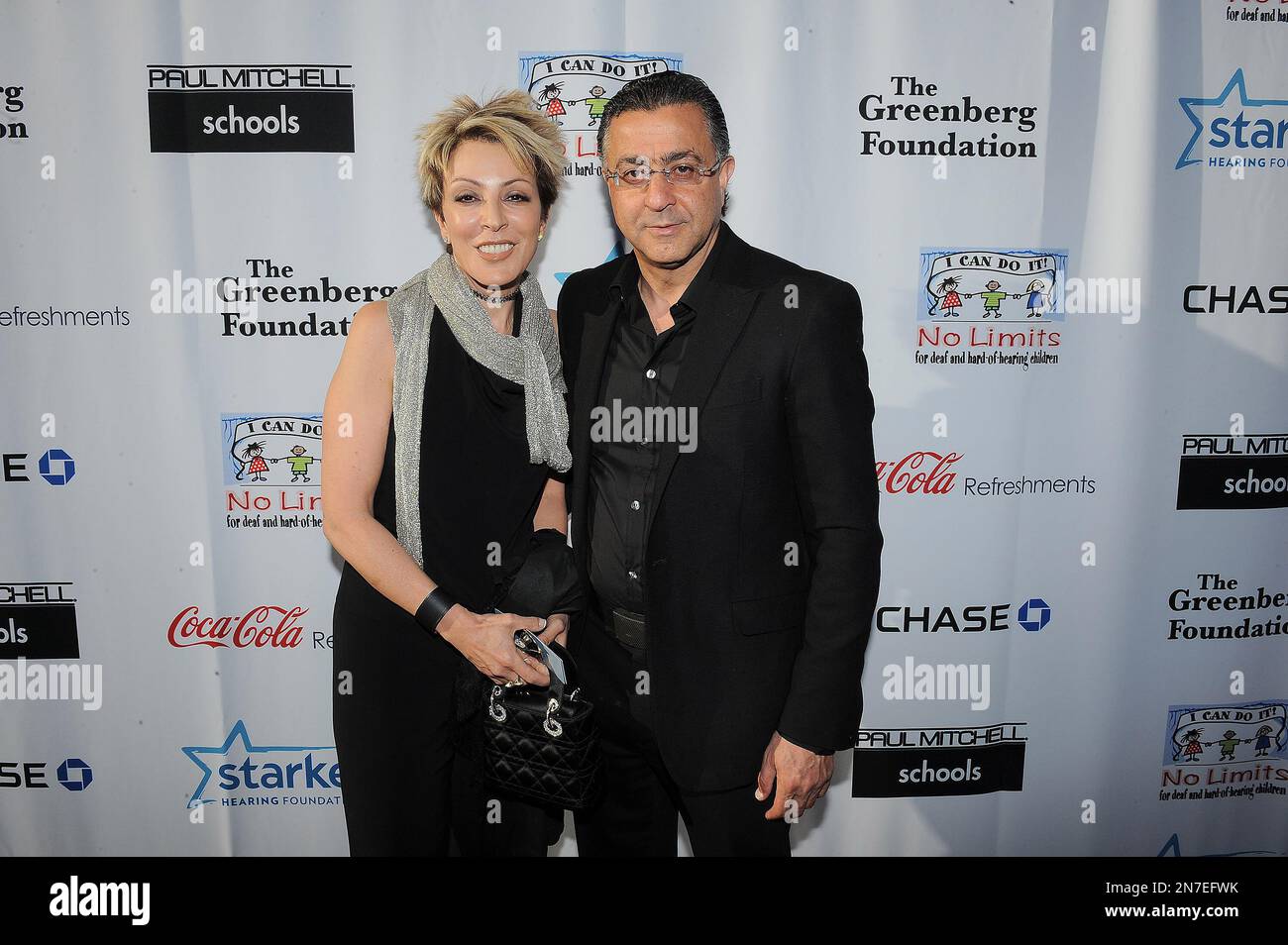 From left, event sponsor Angela Nahai of Looking Beyond and husband ...
