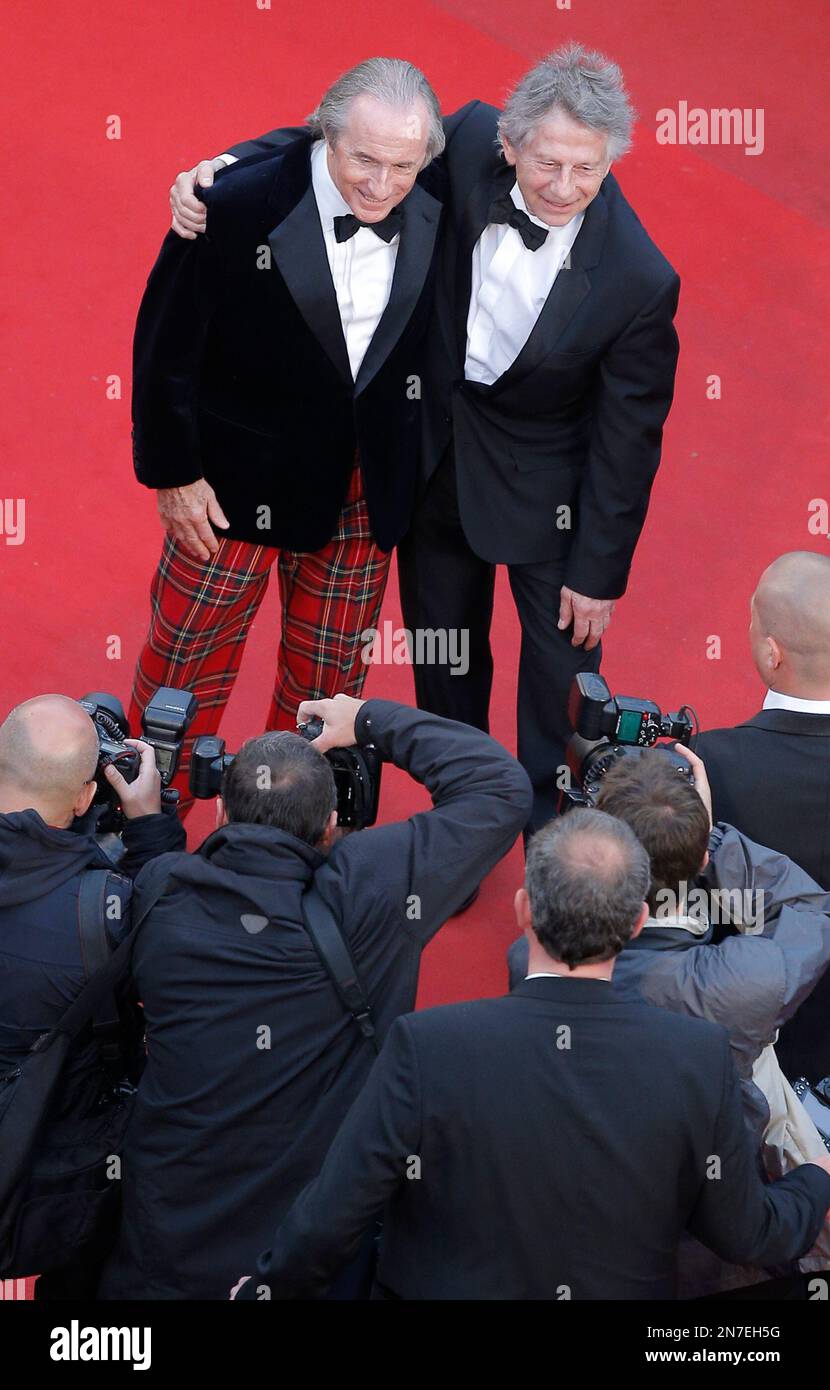 Director Roman Polanski, left, and former race car driver Jackie ...